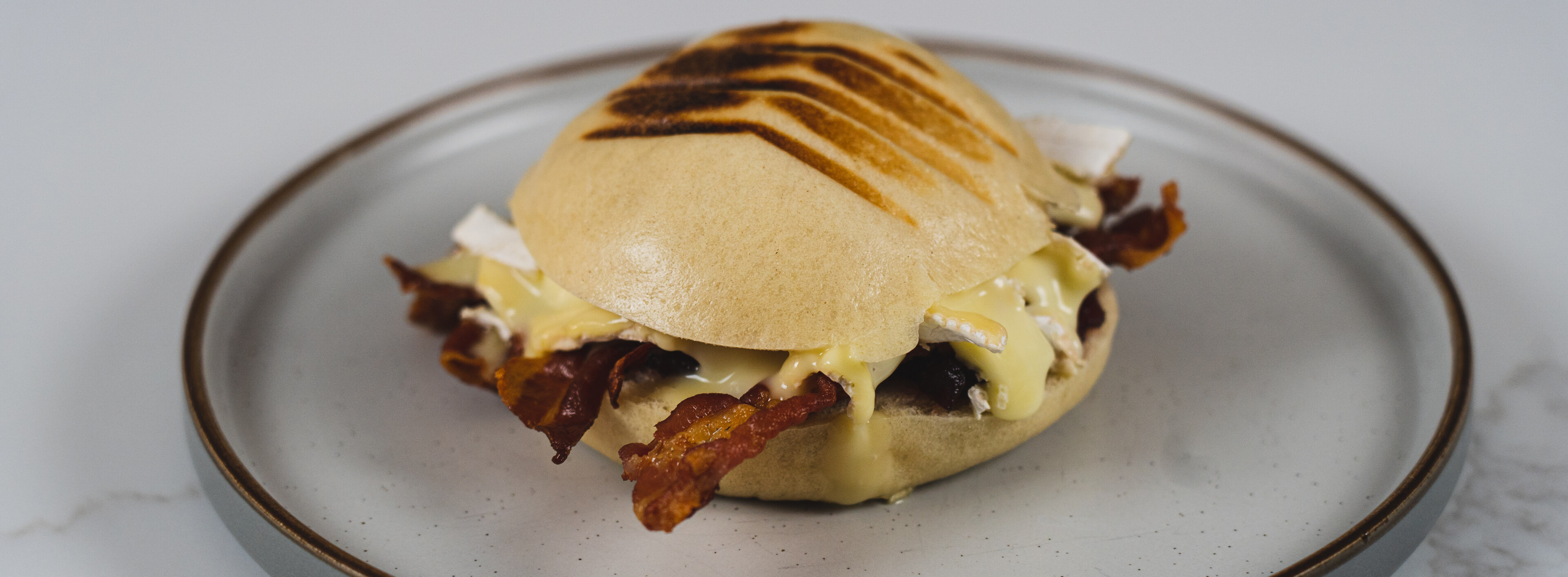 Brie, Bacon & Cranberry Bao Bun - Lactalis Professional | Foodservice